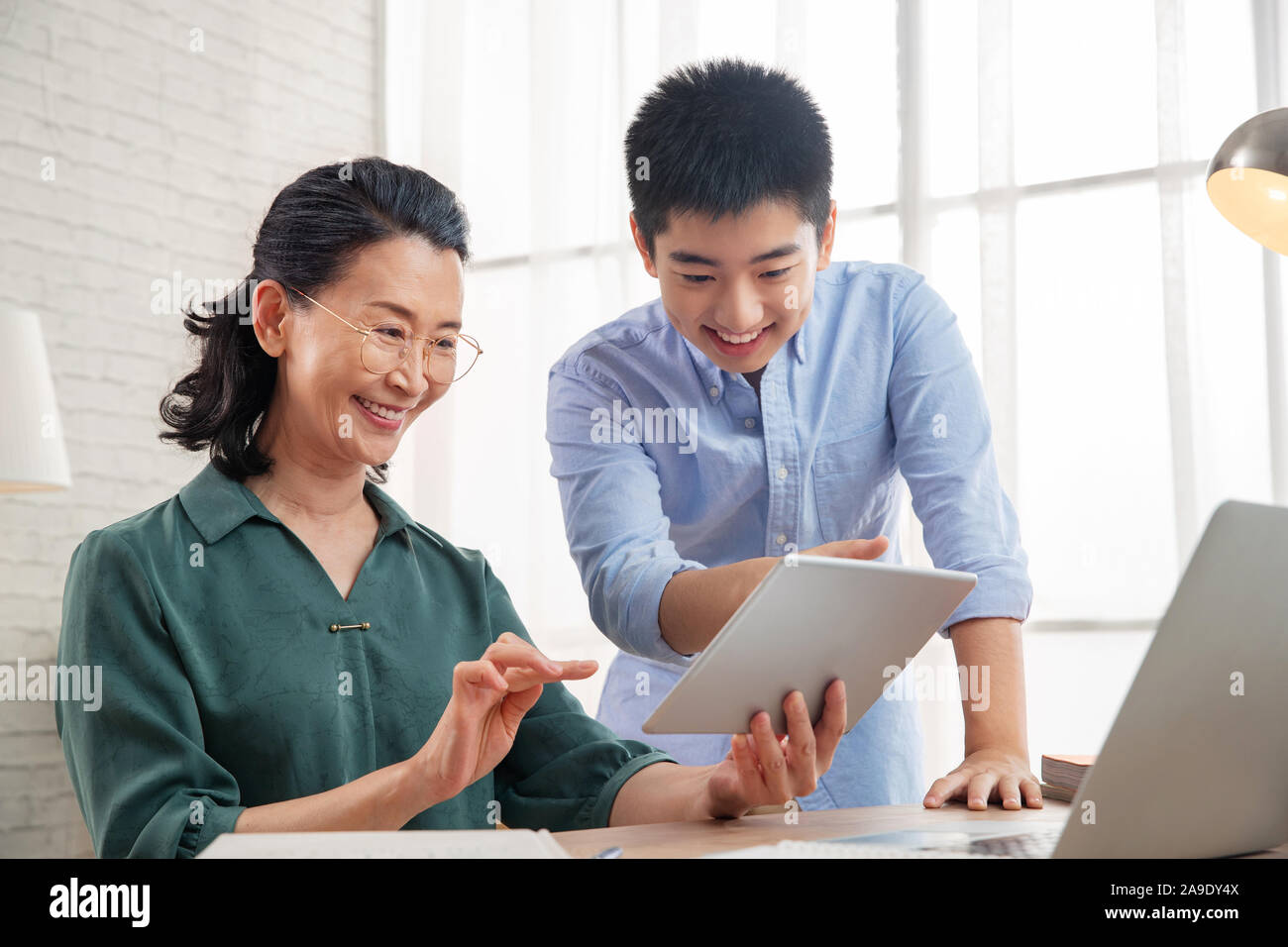 Old people learn to use computers Stock Photo - Alamy
