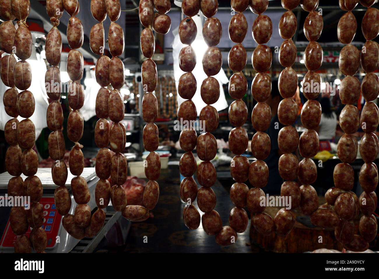 Photo of fresh and raw Filipino sausage called Longganisa Stock Photo ...