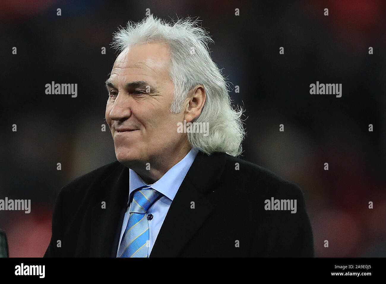 London, UK. 14th Nov, 2019. Gerry Francis on the pitch at half time ...