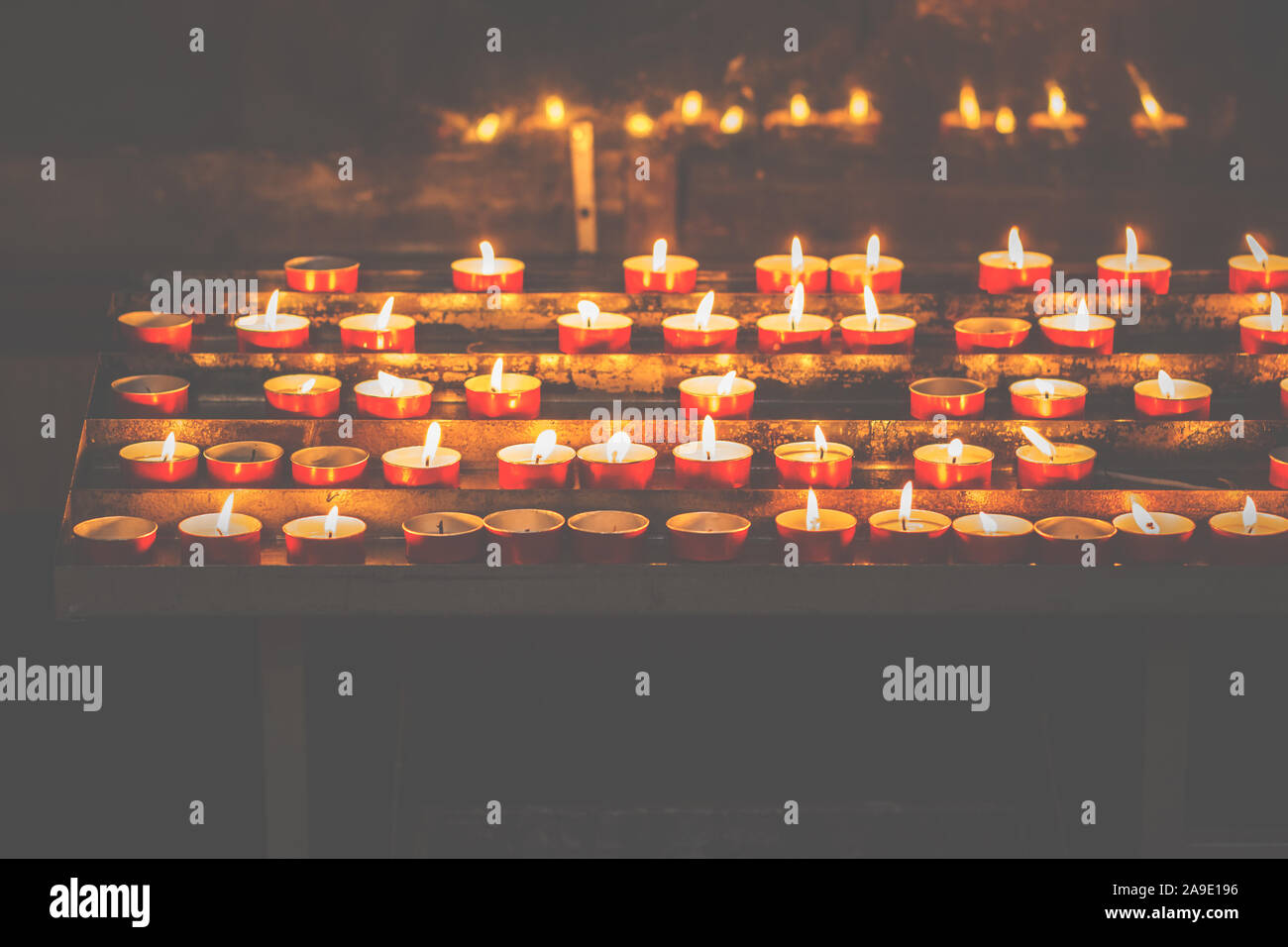 Candles in memorial in a church Stock Photo - Alamy