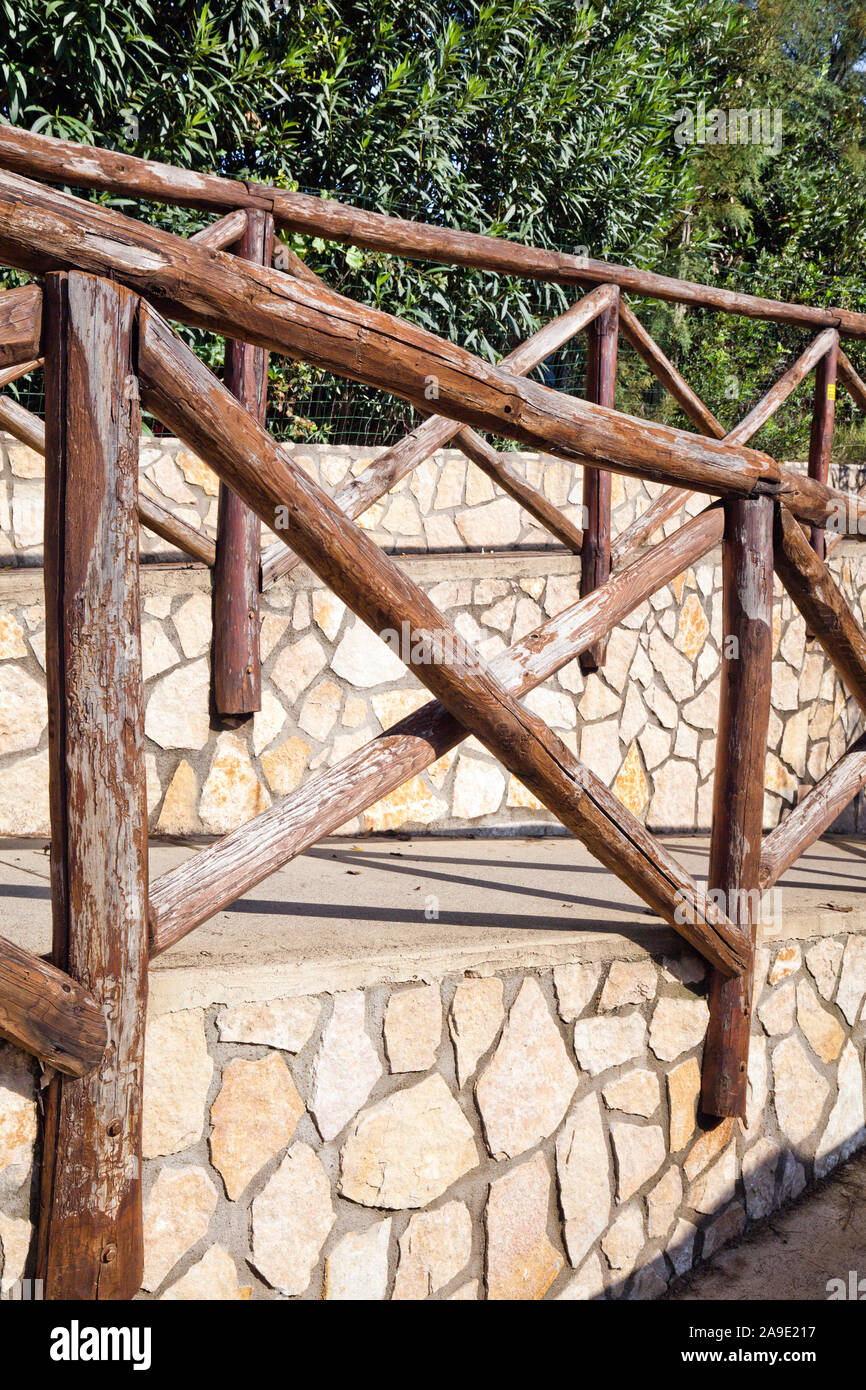 Woodwork railing and slabs on the concreted way Stock Photo - Alamy