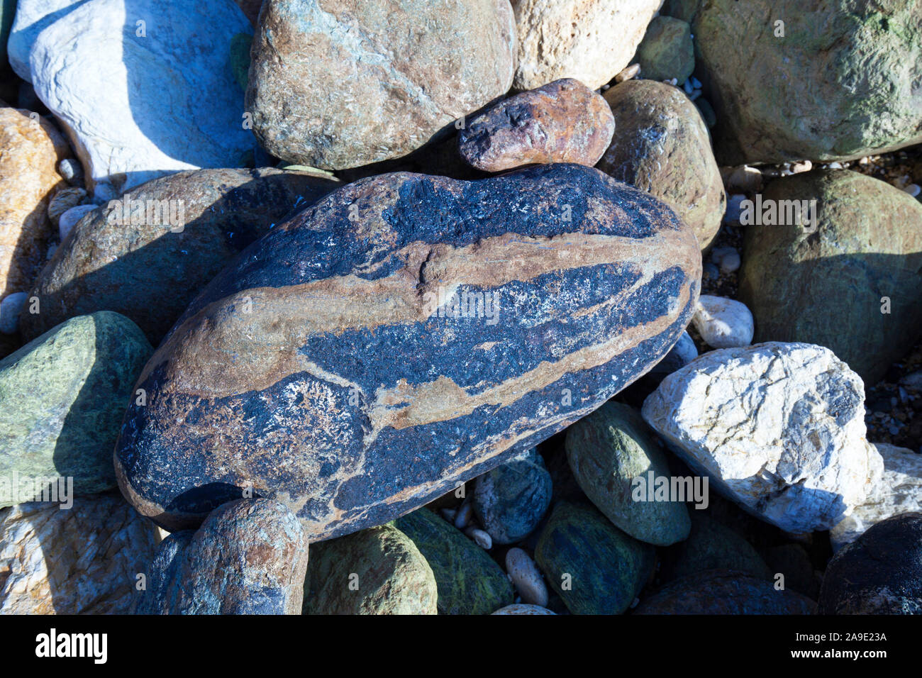 Rock with content of ores and minerals Stock Photo - Alamy