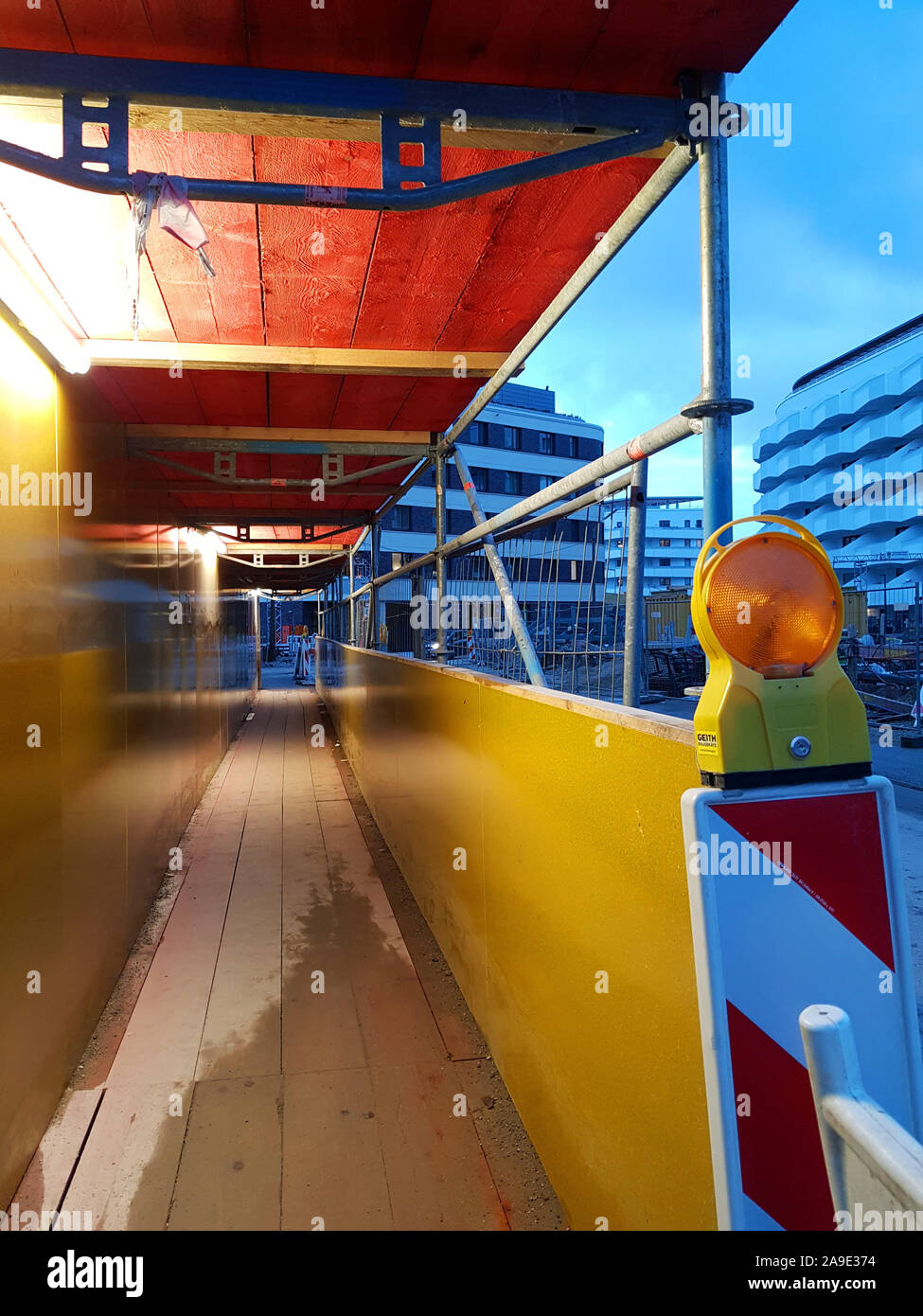 Pedestrian passage in the new building area Stock Photo - Alamy