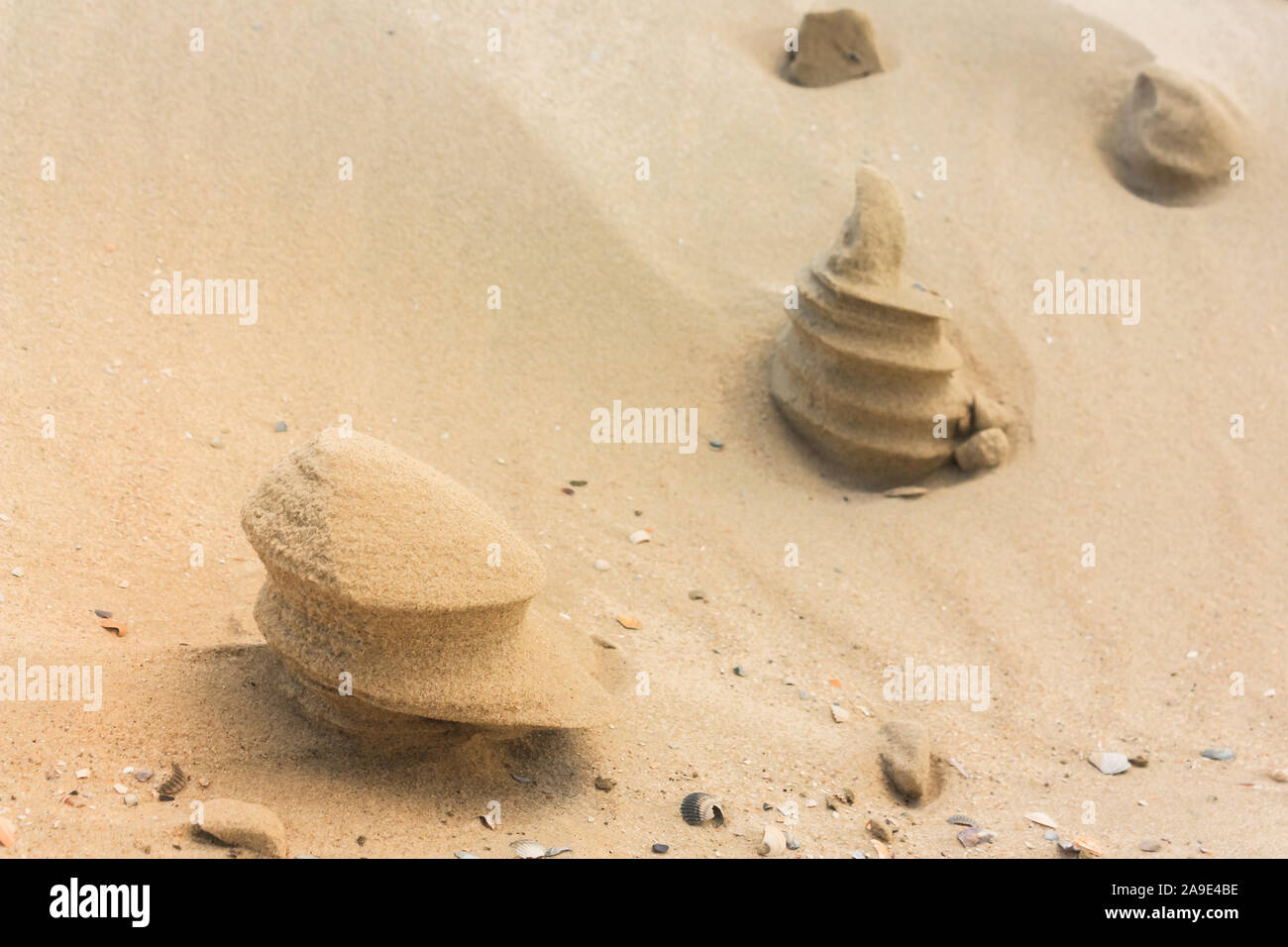 Sculptures in Sand, natural monuments by the North Sea Stock Photo - Alamy