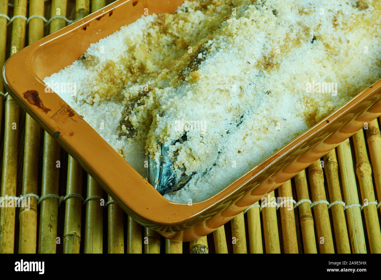 Whole Fish mackerel Baked in Salt Crust Stock Photo - Alamy