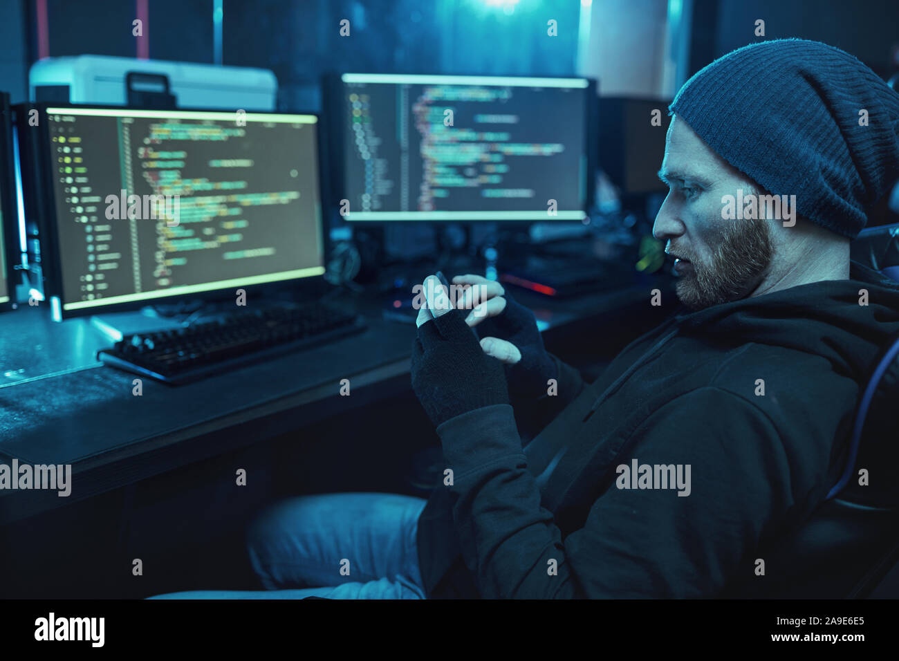 Security man looking at monitors hi-res stock photography and images ...