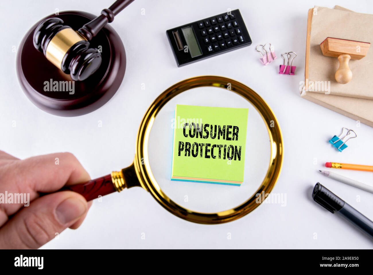 Consumer protection, Law and justice concept. Man's hand, holding ...
