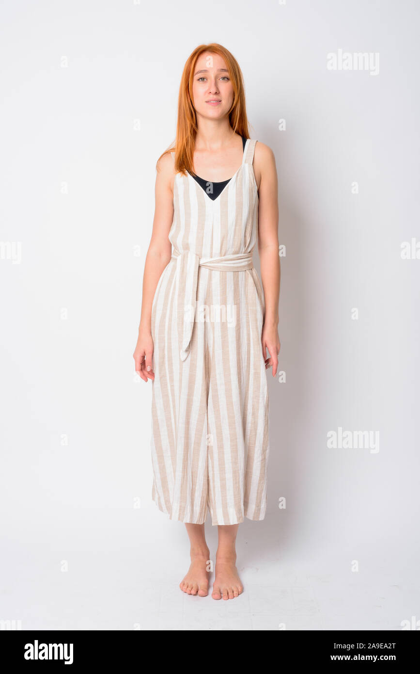 Full body shot of young beautiful redhead woman Stock Photo - Alamy