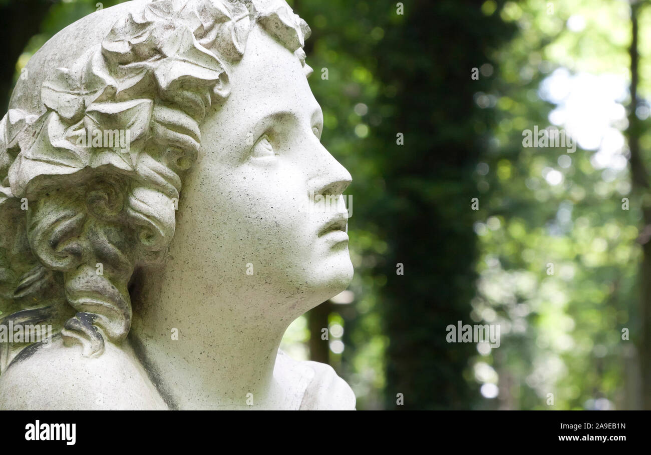 An image of a nice stone angel face Stock Photo - Alamy