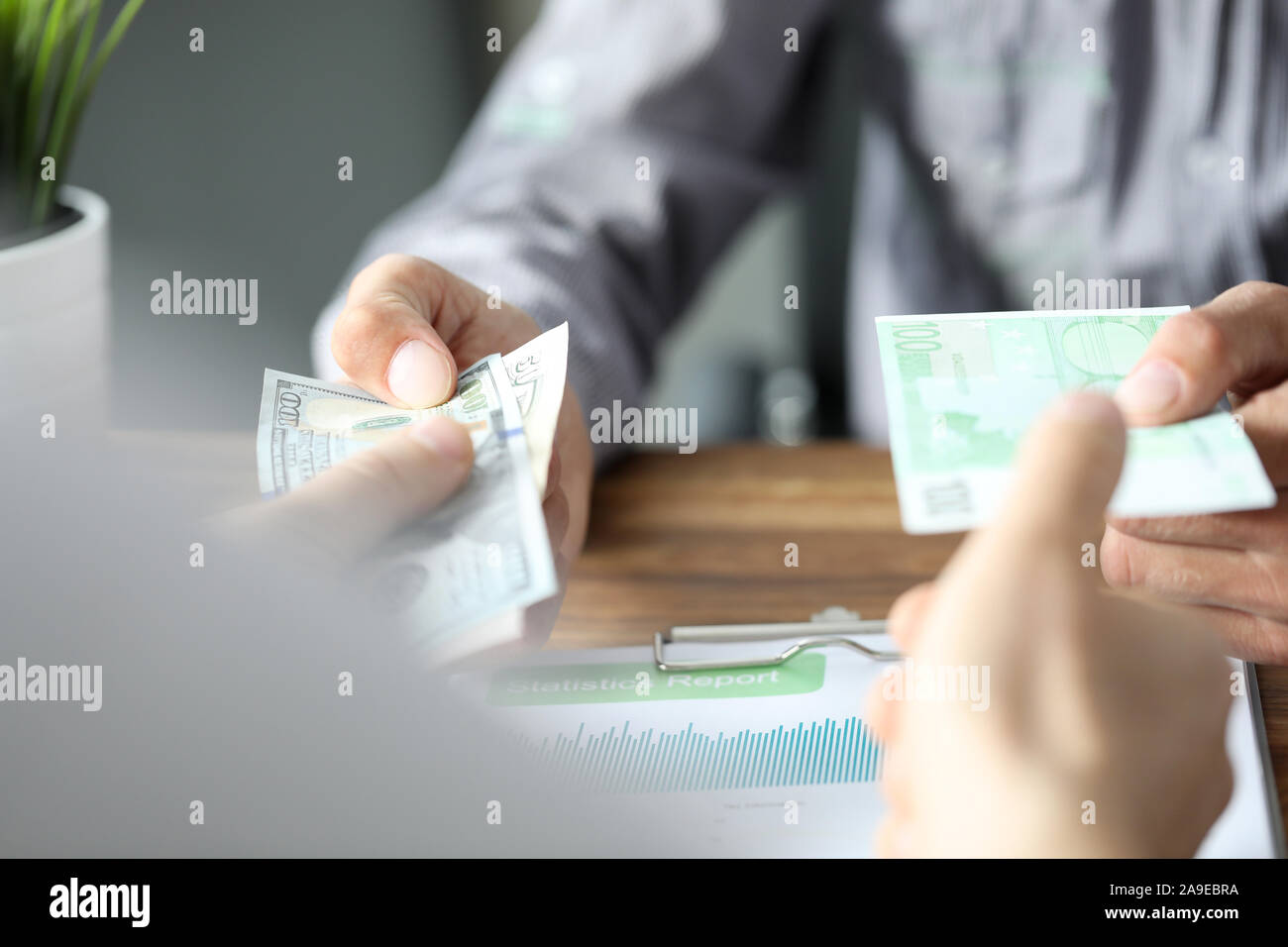 People exchanging money cash Stock Photo - Alamy