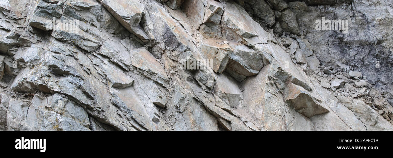 Close-up of abstract rock texture background with cracks and chips ...