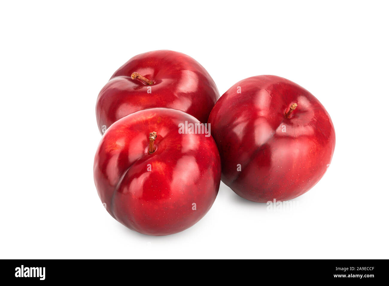 fresh red plum isolated on white background Stock Photo - Alamy