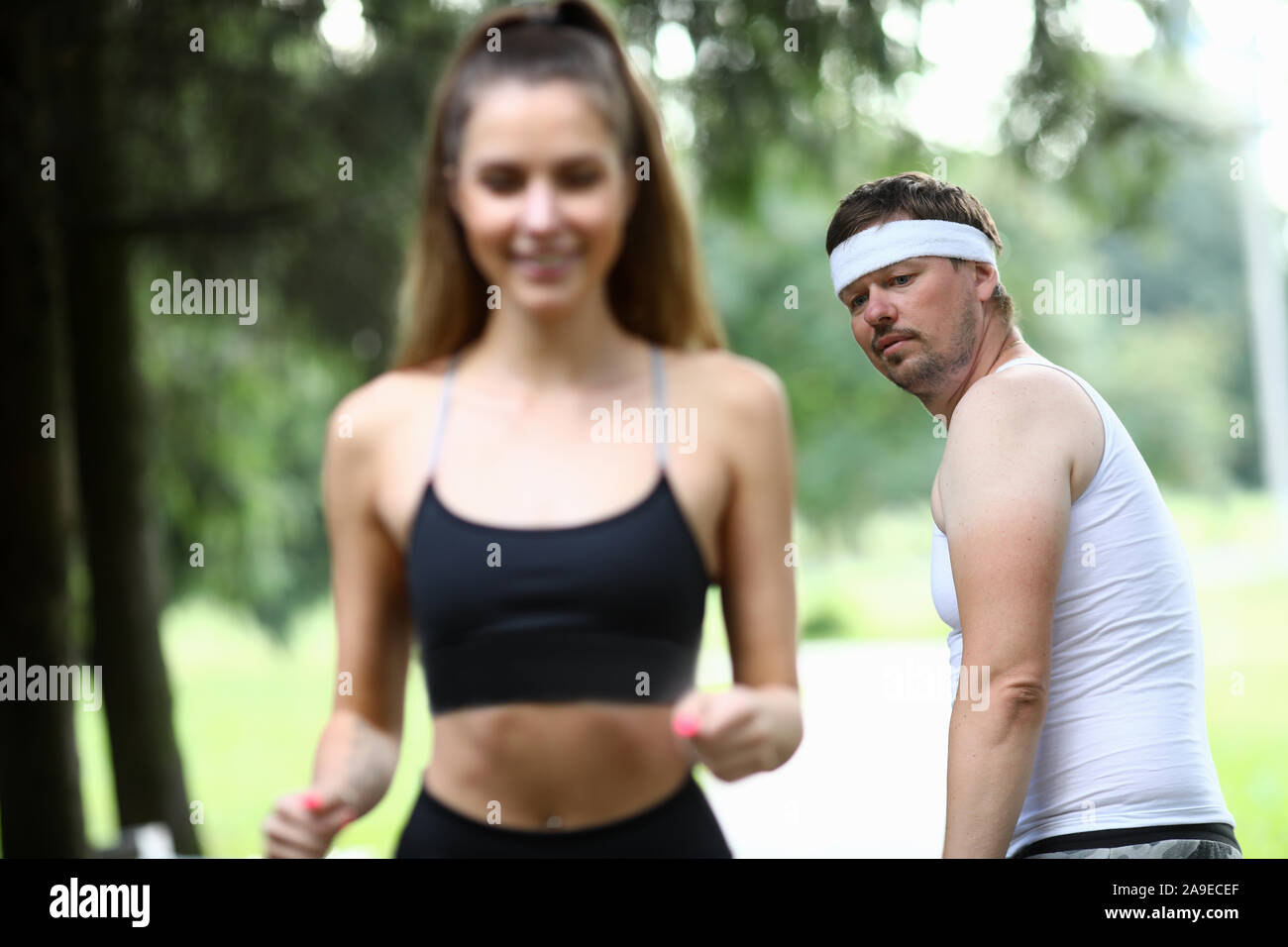 Man turning around on girl Stock Photo - Alamy