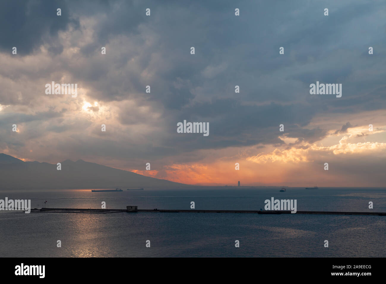 Dramatic sunset landscape with moody sky. Bay of Izmir city, Turkey ...