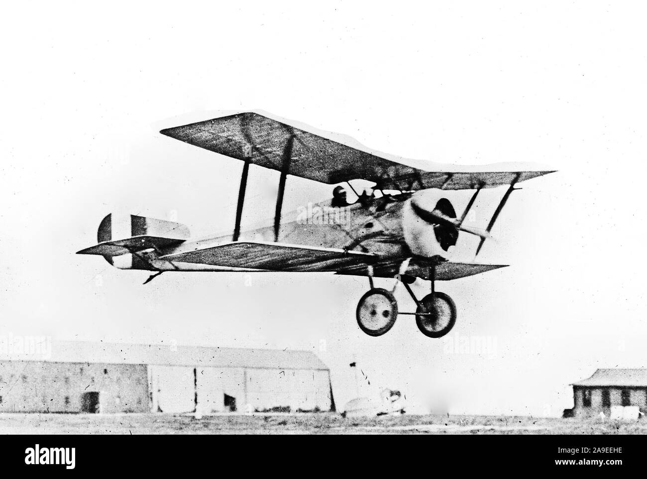 Early 1900s biplane landing at an airfield Stock Photo - Alamy