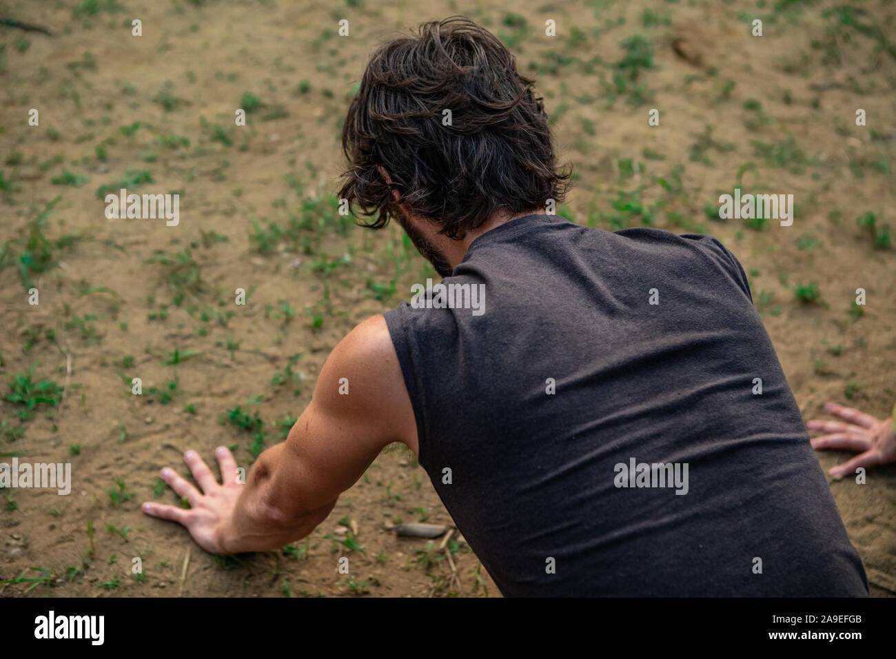 Kneeling facing hi-res stock photography and images - Alamy