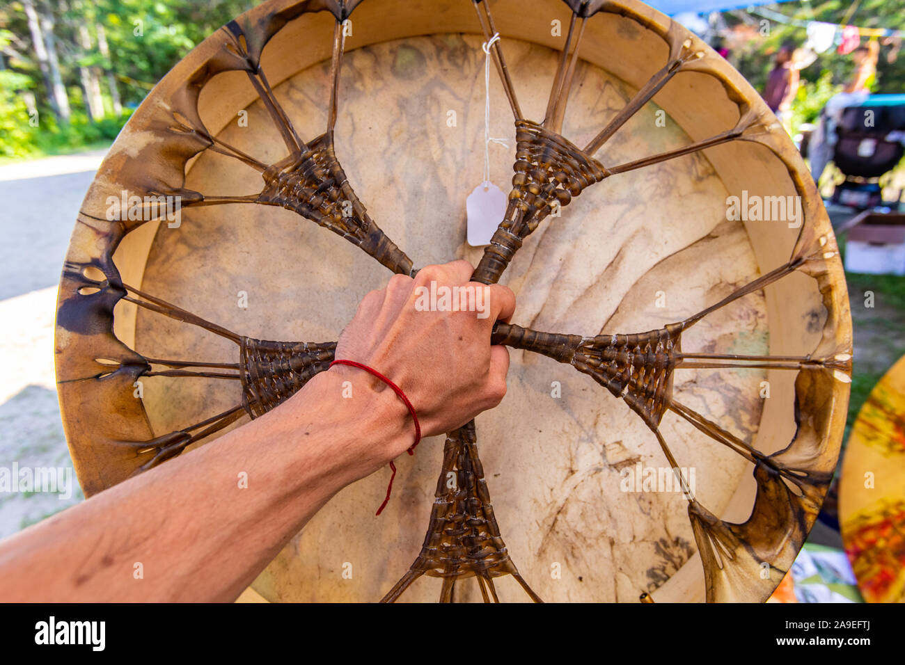 selective focus on caucasian women hand playing Sacred drum, close up ...