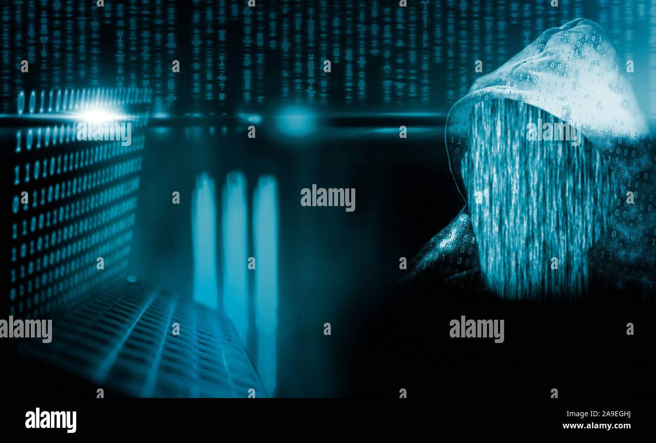 Faceless, anonymous computer hacker with hood Stock Photo - Alamy