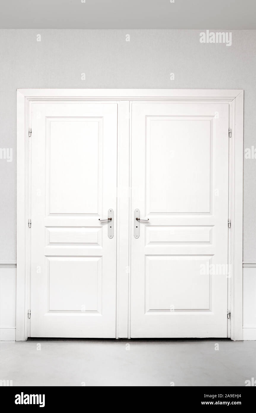 Closed double door Stock Photo - Alamy