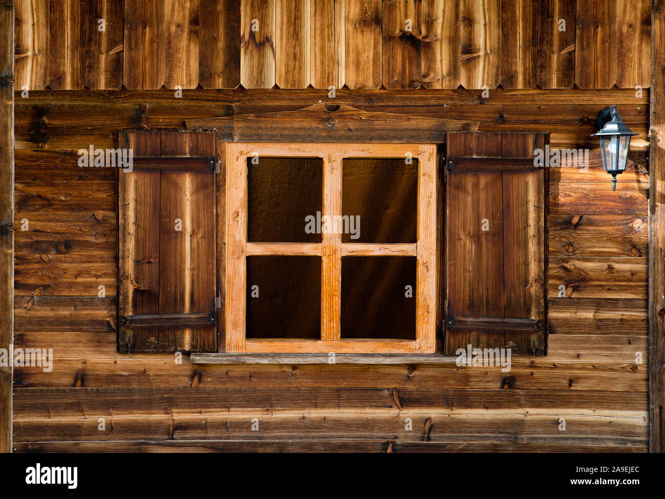 Window in the alpine hut Stock Photo - Alamy