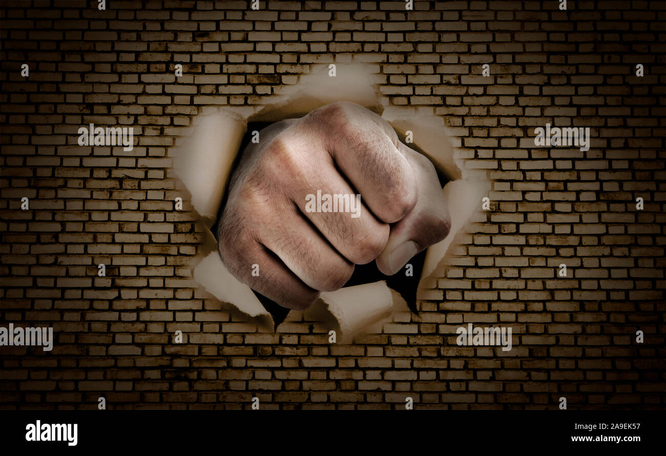 Fist punching through wall hi-res stock photography and images - Alamy