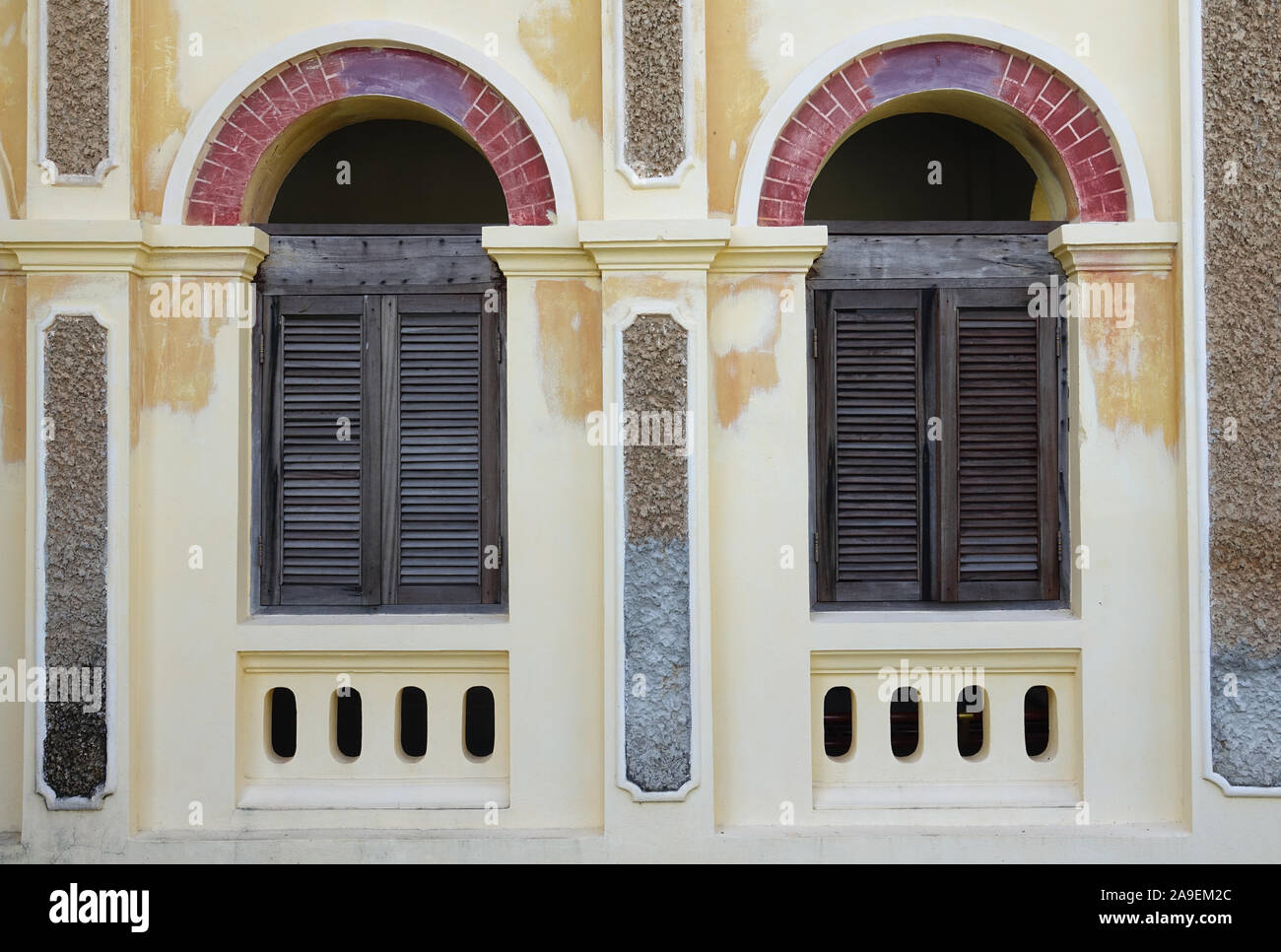 Vintage windows with old style pillar and decoration Stock Photo - Alamy
