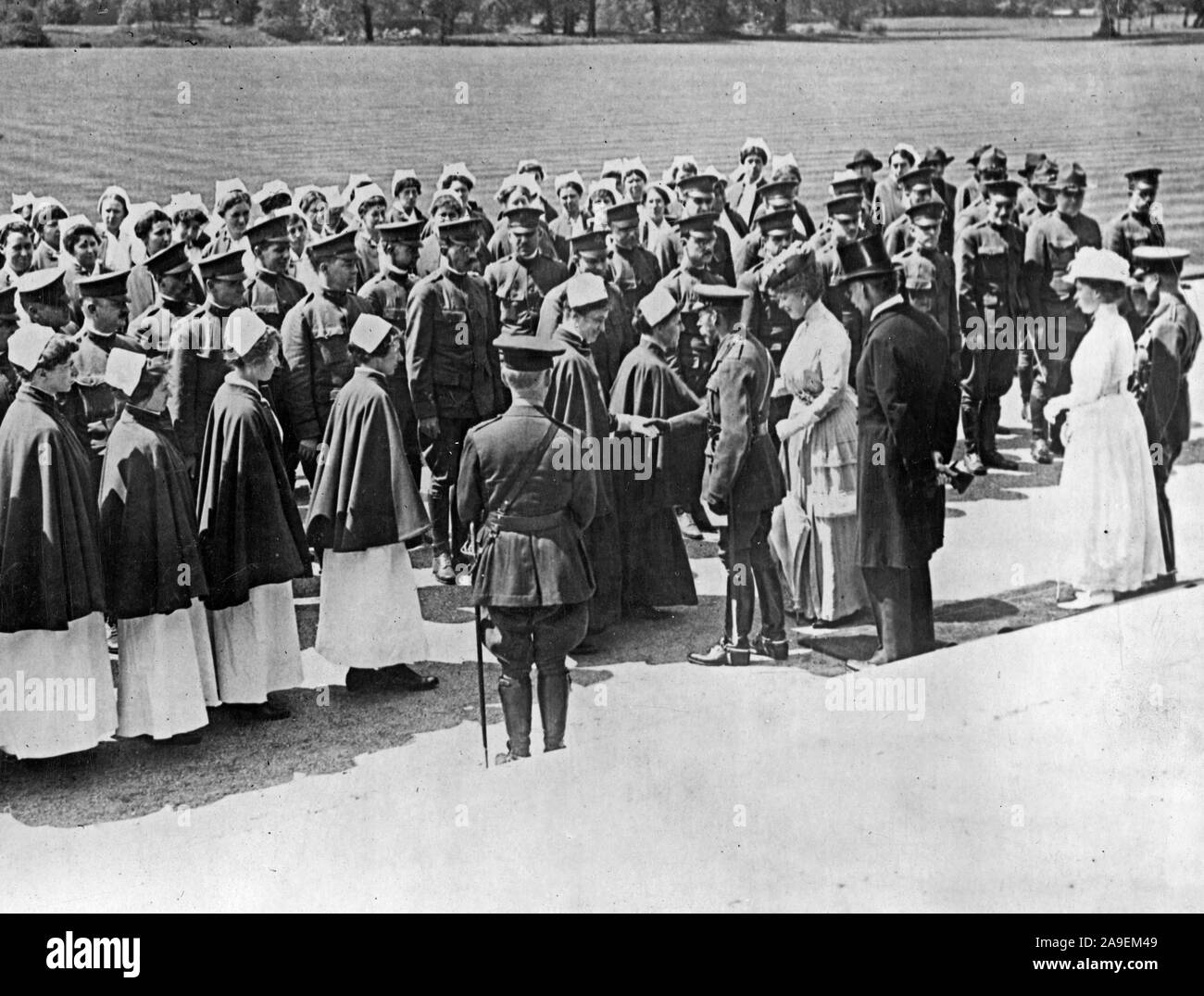 King Queen receive American drs and nurses. King George and Queen Mary ...