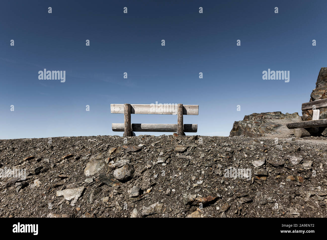Quiet bench in the high mountains Stock Photo - Alamy