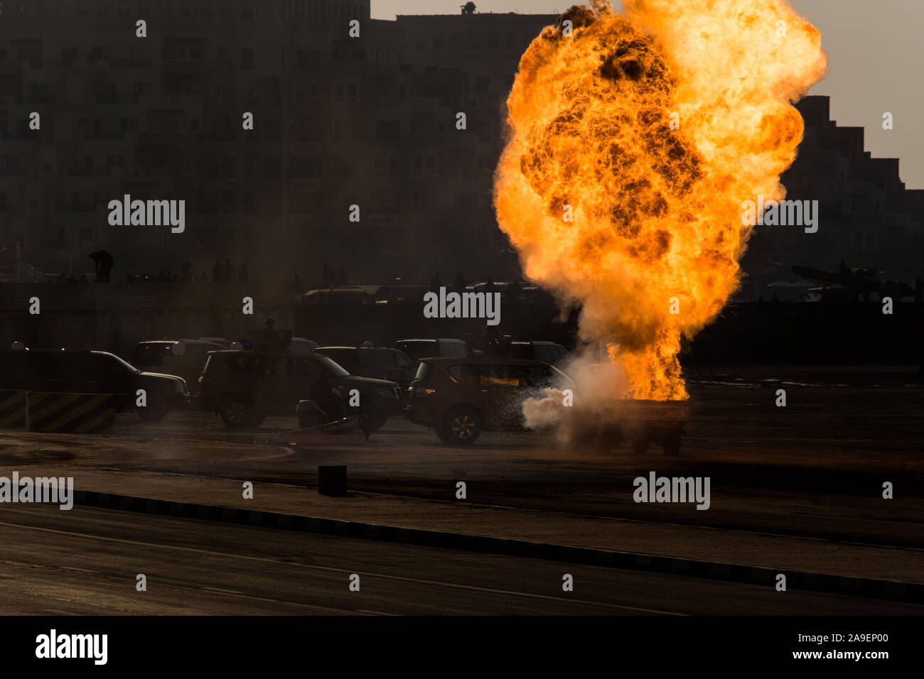 Military strike or bomb on a car in war causes fire ball and explosion ...