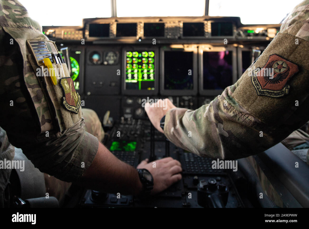 Flight crew in the cockpit of a US Air Force MC-130J Commando II from ...