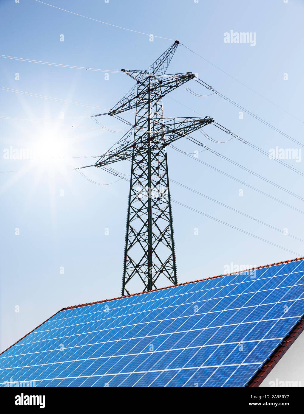 Electricity pylon and solar system Stock Photo - Alamy