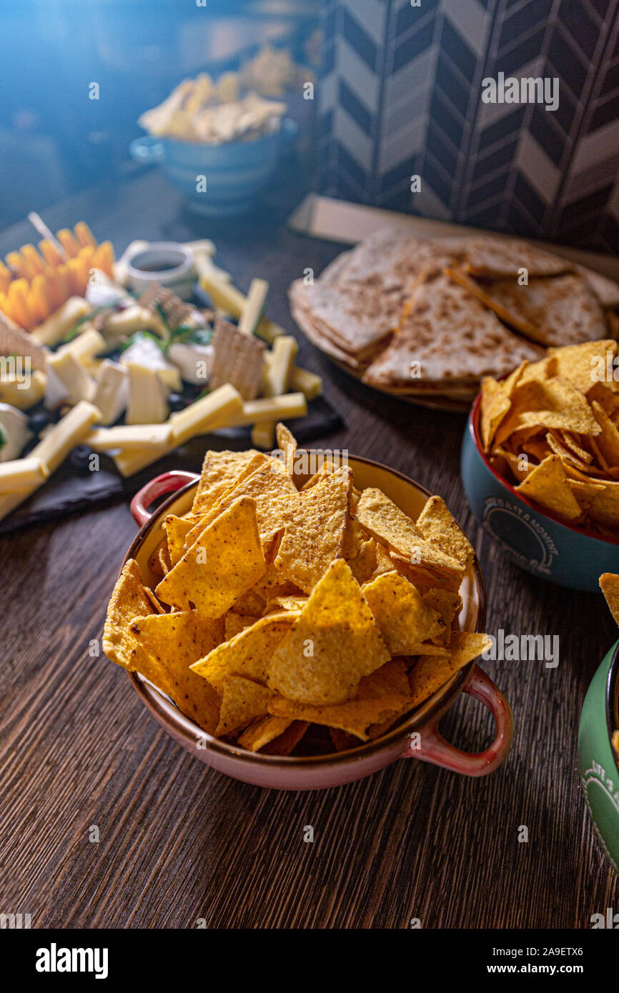 Savory snack party food selection on bistro table Stock Photo - Alamy
