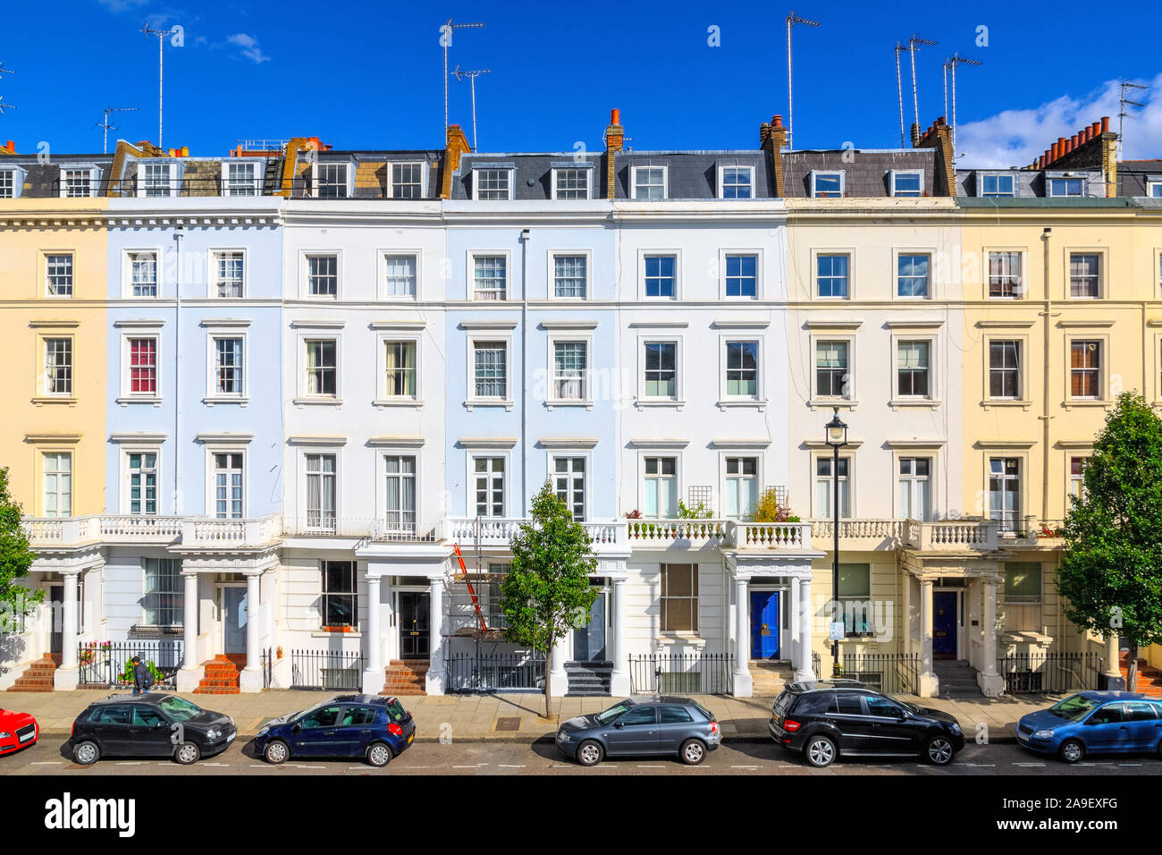 Facade of colourful terraced houses around Pimlico area in London Stock ...