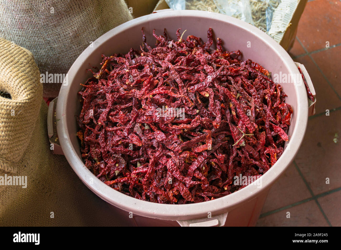 Dry chilli peppers on the market. Spicy asian food Stock Photo - Alamy