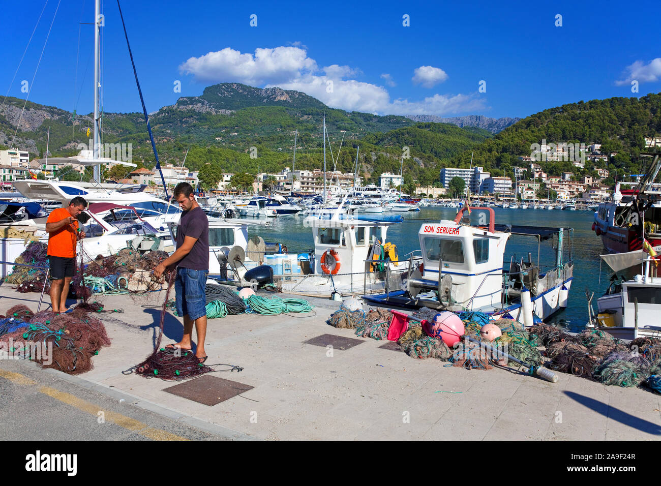 Checking boats hi-res stock photography and images - Alamy