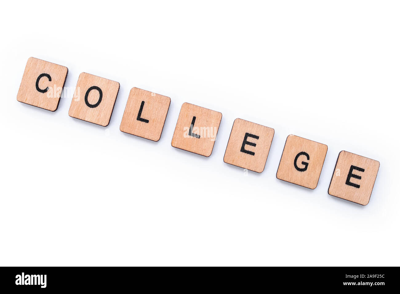 The word COLLEGE, spelt with wooden letter tiles over a white ...