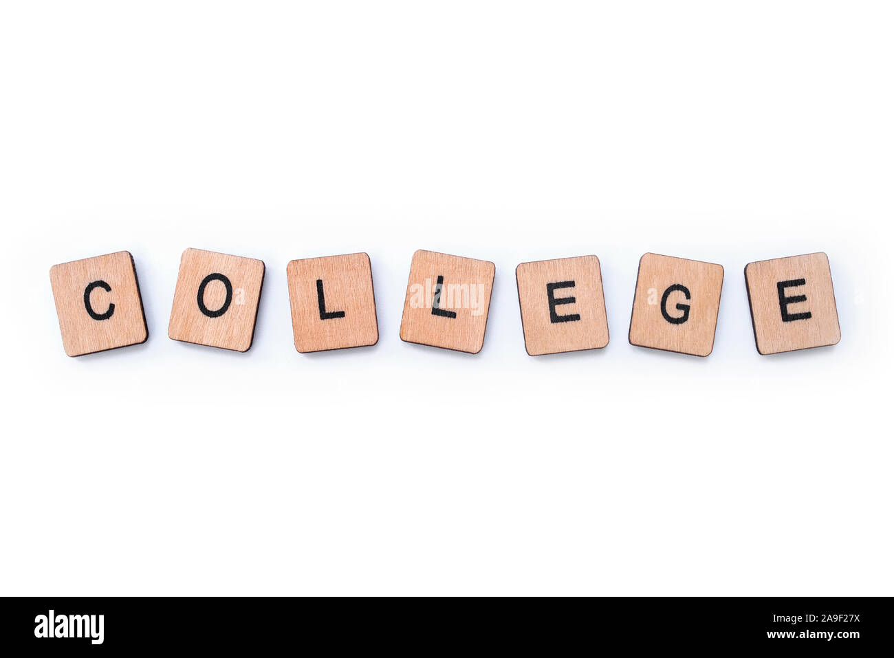 The word COLLEGE, spelt with wooden letter tiles over a white ...