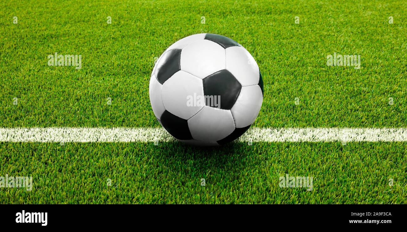 Ball on centre of football pitch hi-res stock photography and images ...