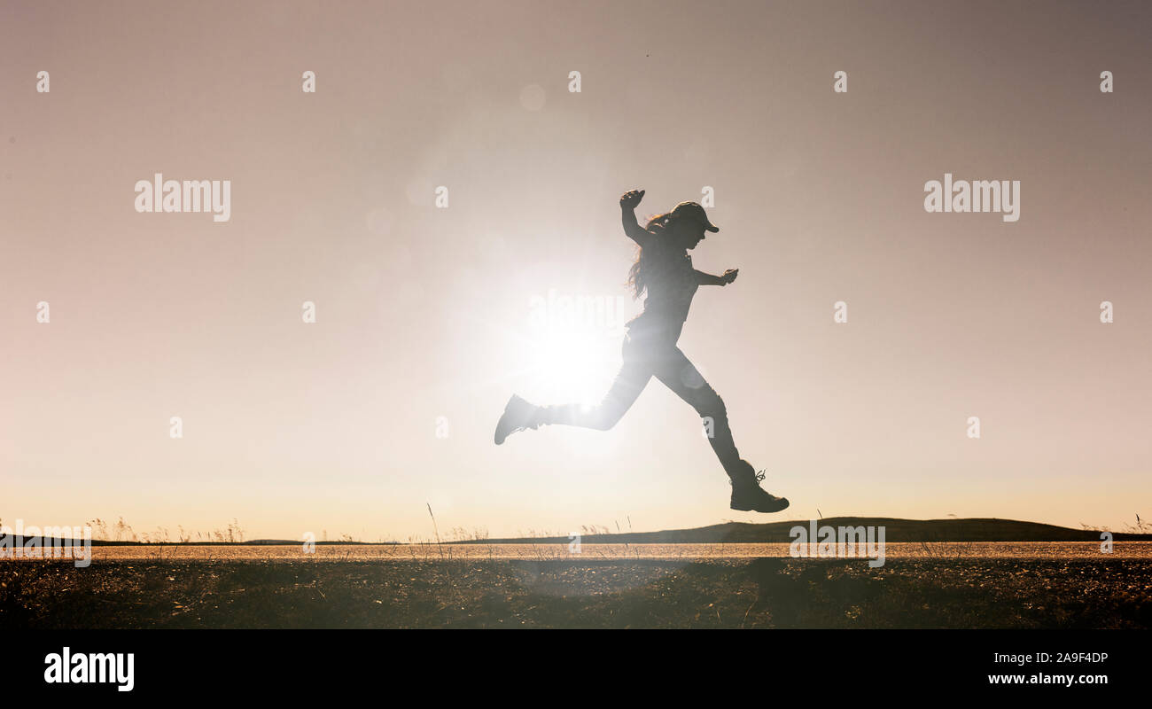 Runner jumping leaping hi-res stock photography and images - Alamy