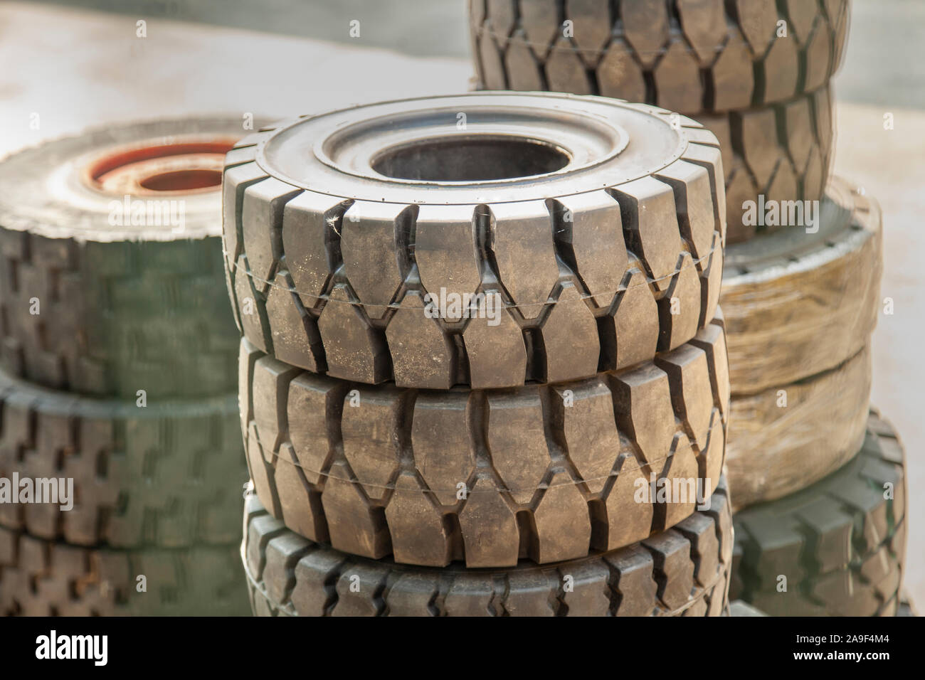 The wheels are stacked. Spare wheels for the car. Spare parts from ...