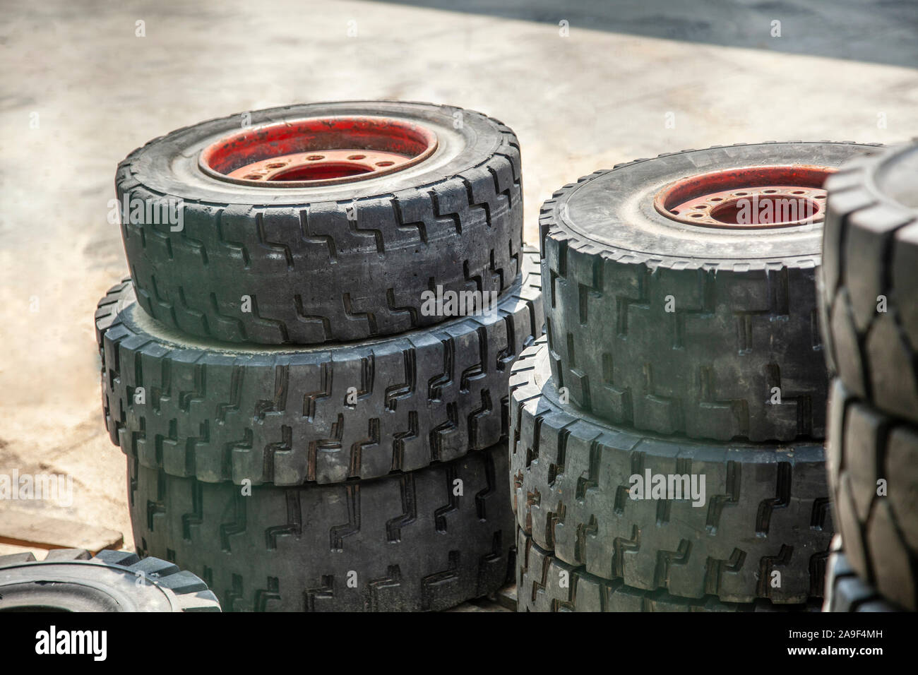 The wheels are stacked. Spare wheels for the car. Spare parts from ...