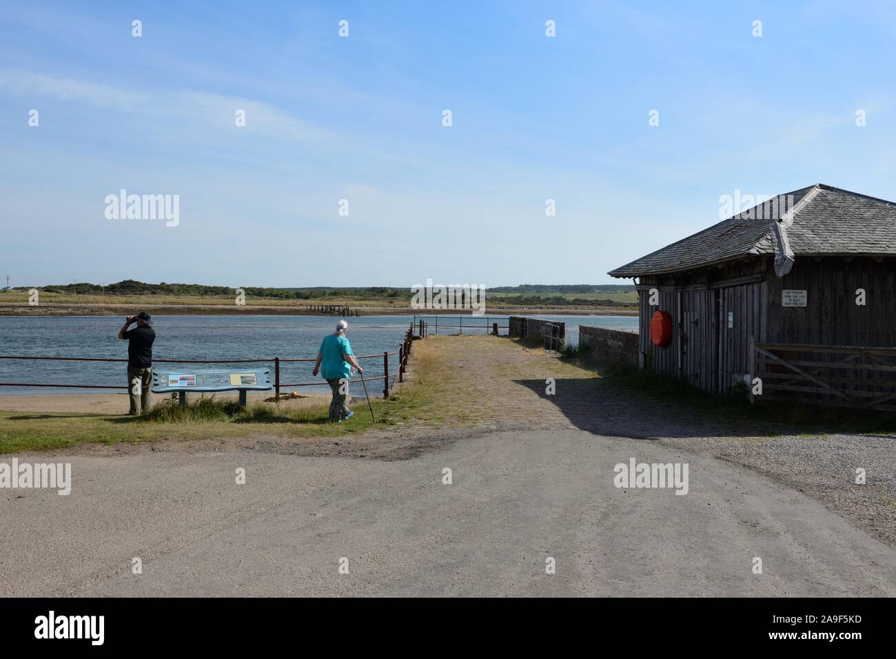 The pier at Littleferry on the north side of Loch Fleet National Nature ...