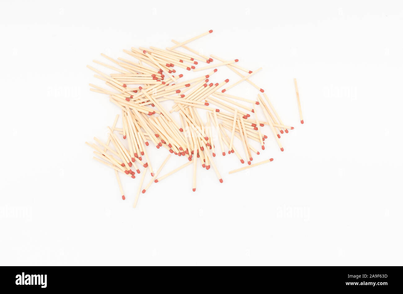 bunch of matches on a white surface Stock Photo - Alamy