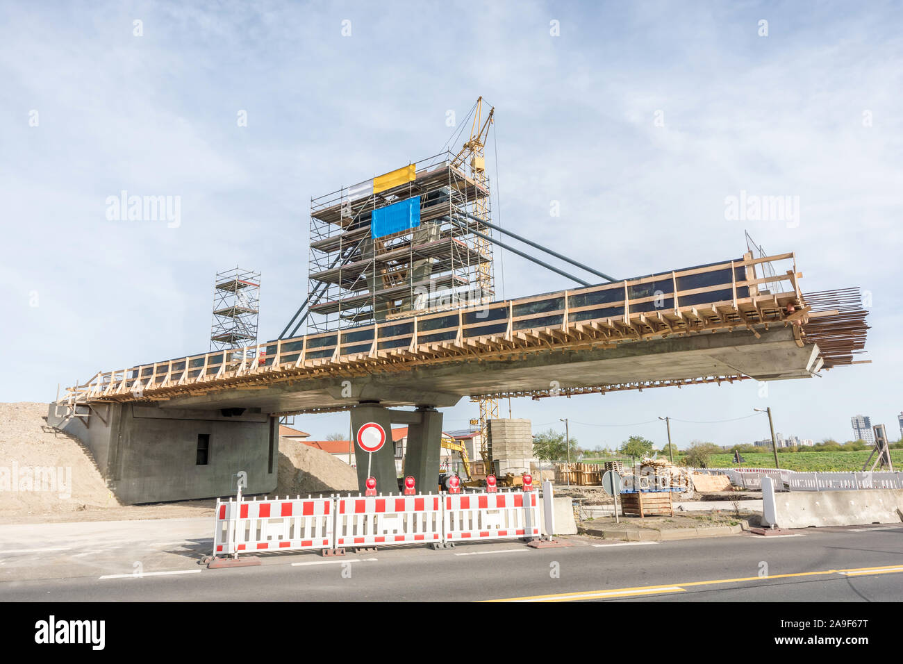 Construction of a cable-stayed bridge over a freeway Stock Photo - Alamy