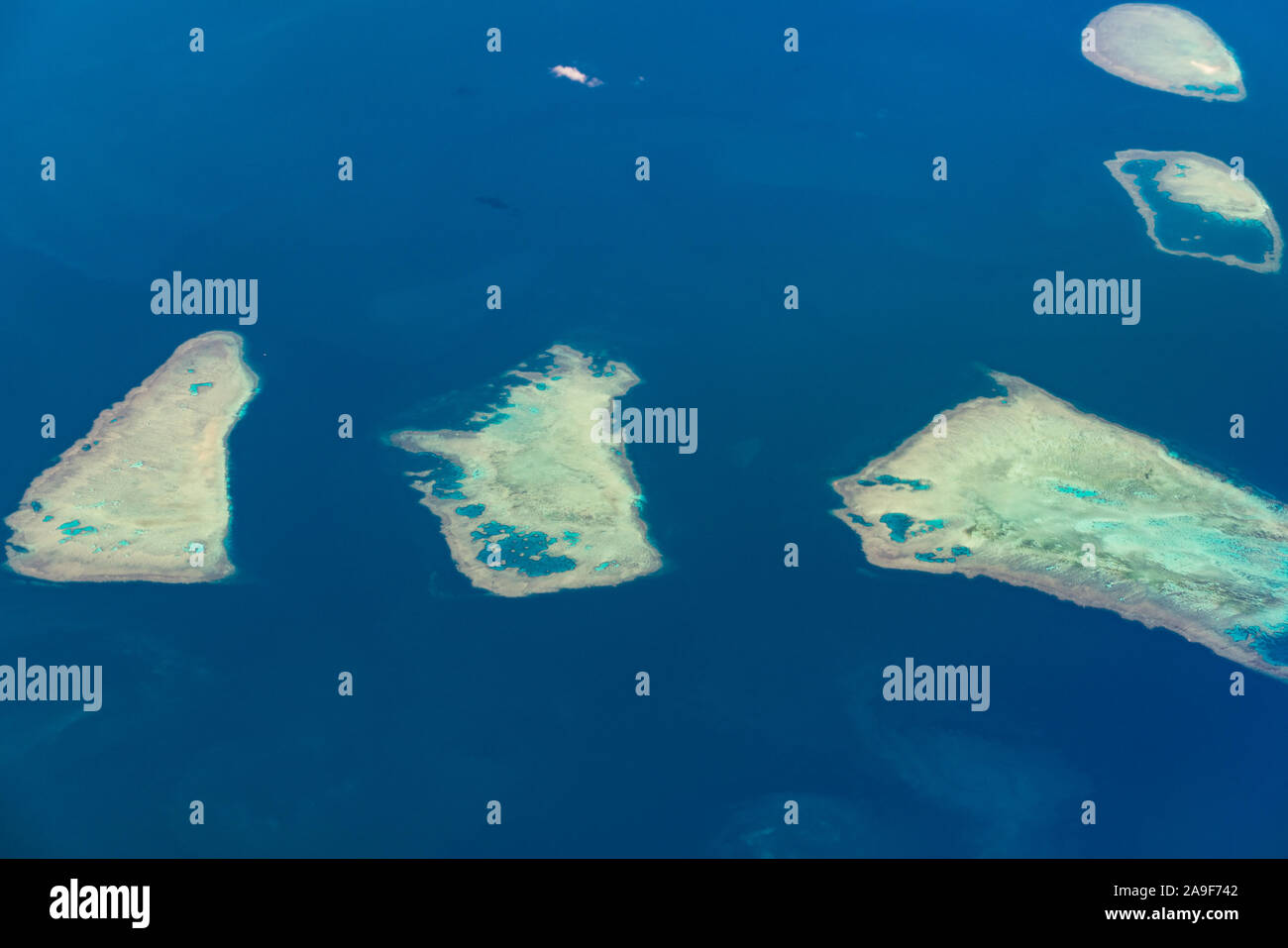 Aerial view of Paul Reef of The Percy Group of corals. Great Barrier ...