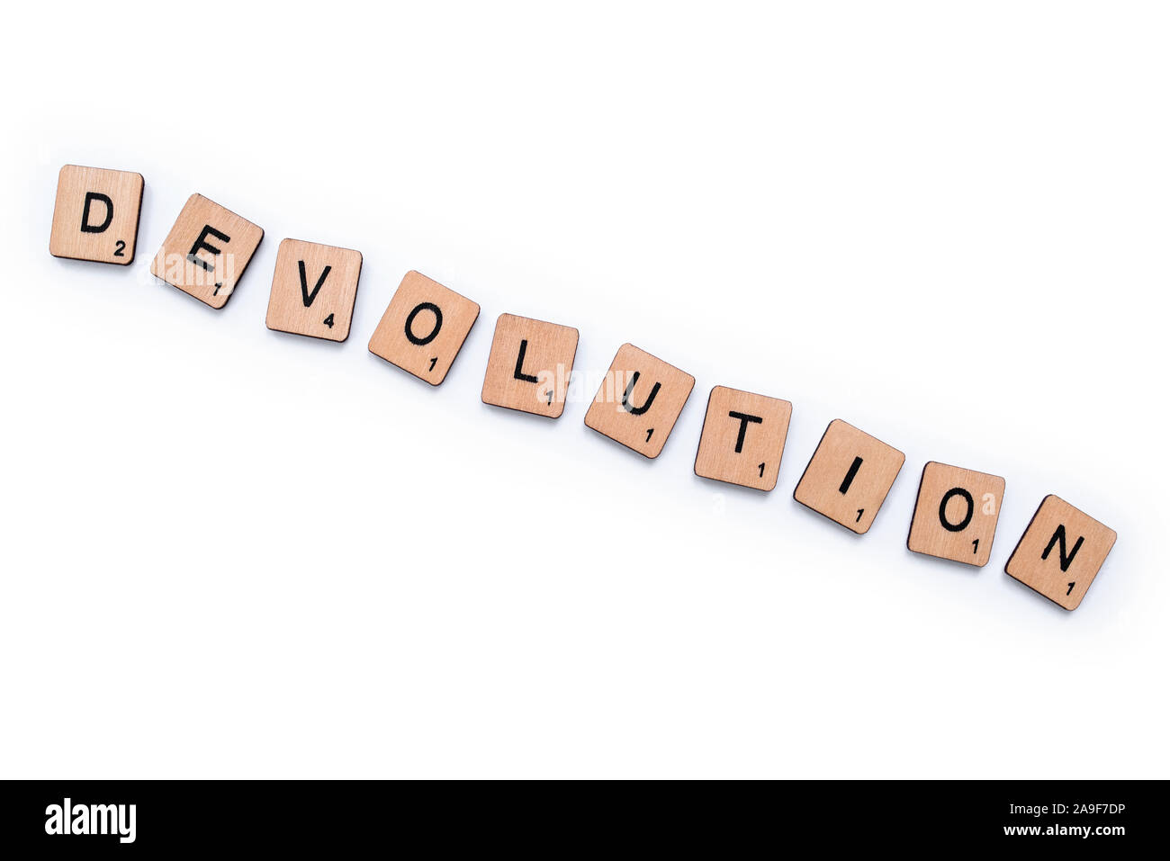 London, UK - March 27th 2019: The word DEVOLUTION, spelt with wooden ...