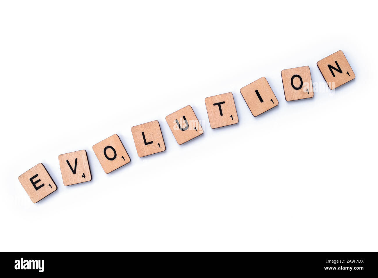 London, UK - March 27th 2019: The word EVOLUTION, spelt with wooden ...