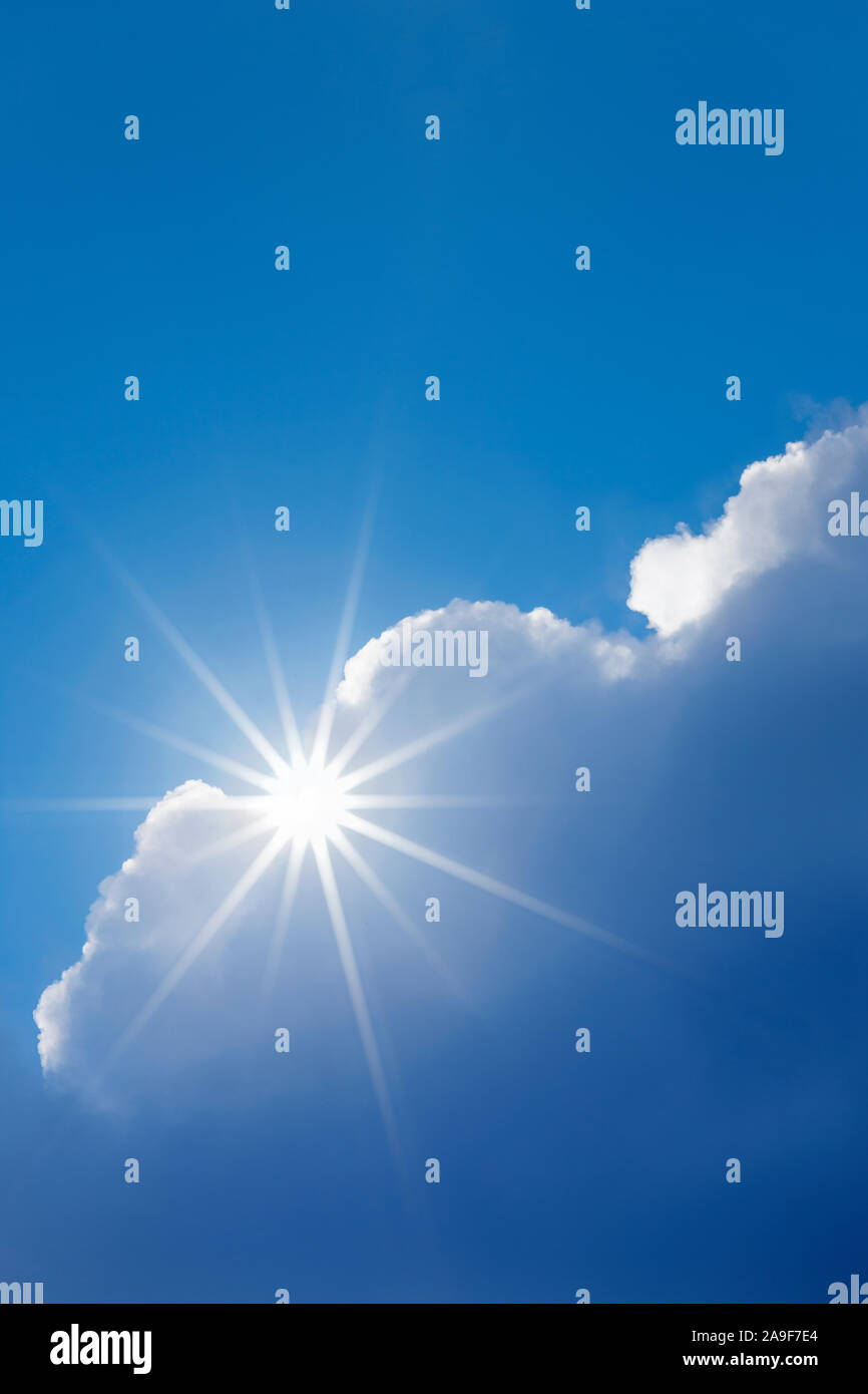 Blue sky clouds and emerging sun hi-res stock photography and images ...