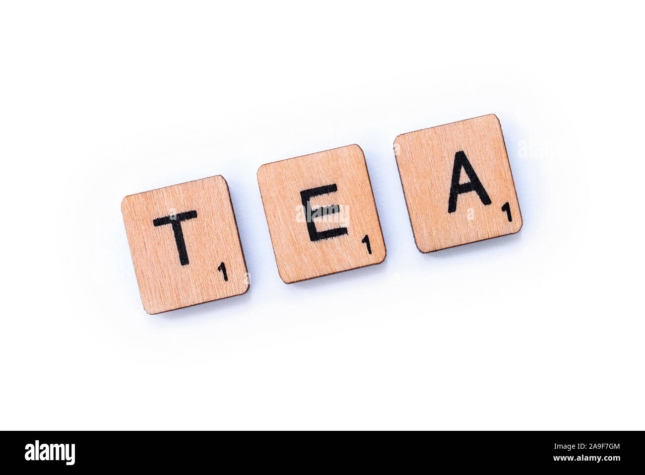London, UK - March 27th 2019: The word TEA, spelt with wooden letter ...