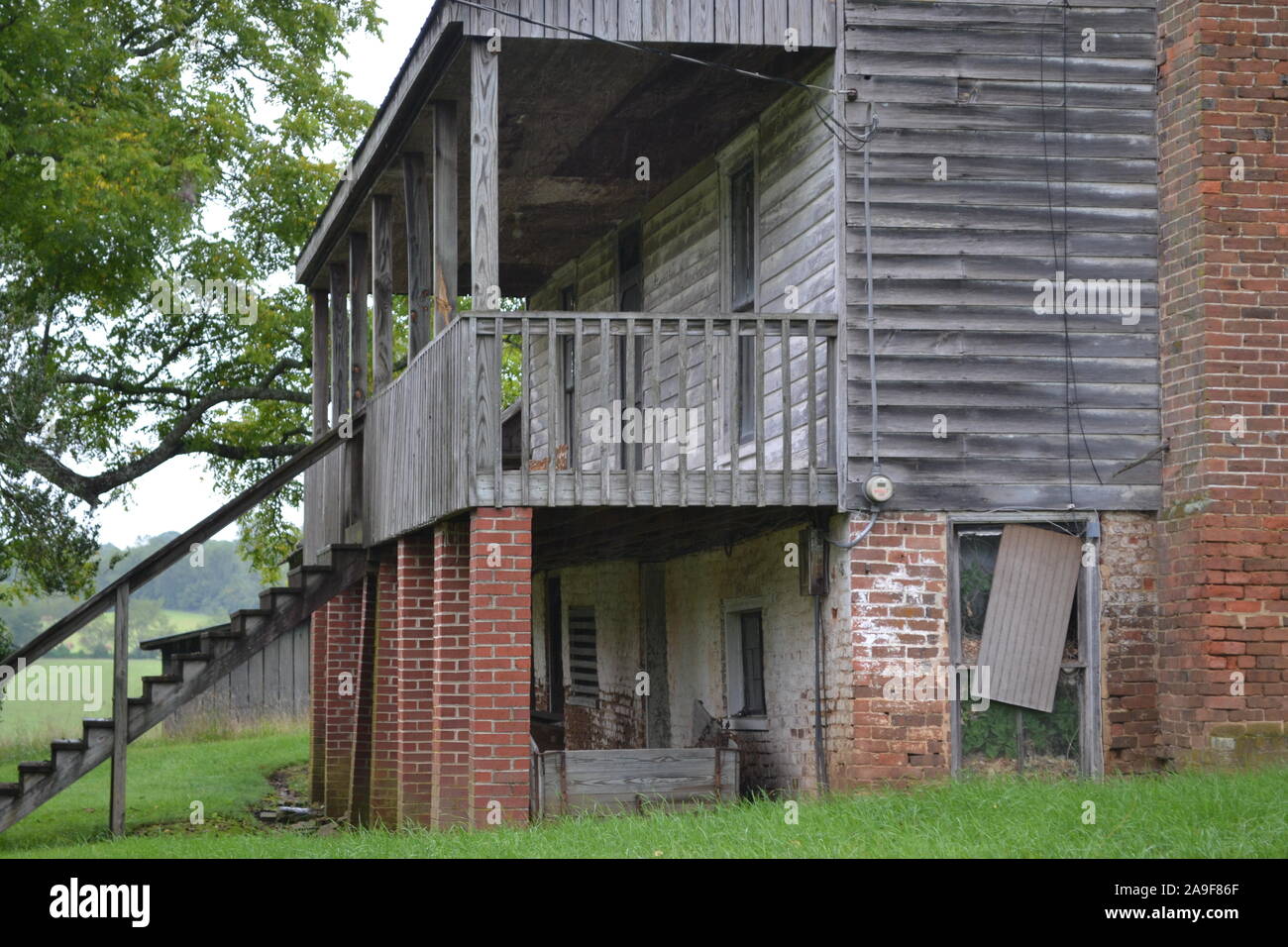 Old wooden abandoned homestead Stock Photo - Alamy